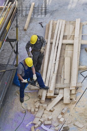 Construction Workers Cutting Wood Boarding Chainsaw Editorial Stock ...