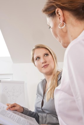 Model Released Two Women Reading Contract Editorial Stock Photo - Stock ...