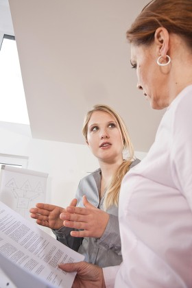 Model Released Two Women Reading Contract Editorial Stock Photo - Stock ...