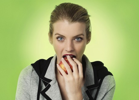 Model Released Young Woman Eating Apple Editorial Stock Photo - Stock ...