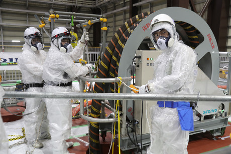 Workers Radiation Protection Suits Operate Insert Editorial Stock Photo ...