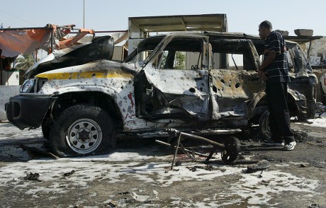 Iraqi Inspects Destroyed Police Car Site Editorial Stock Photo - Stock ...