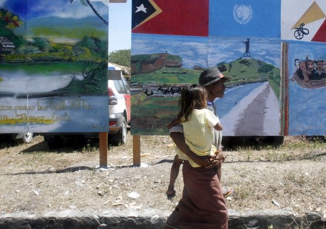 East Timor Man Carries His Child Editorial Stock Photo - Stock Image ...