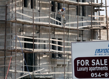 Palestinian Construction Worker Lowers Bucket Cement Editorial Stock ...