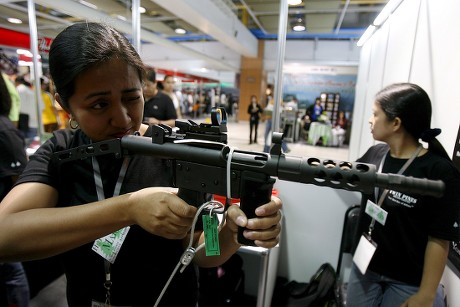 Filipino Sales Representative Demonstrates Philippine Made Editorial ...