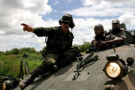 Canadian Military Instructor L Instructs Rwandan Editorial Stock Photo ...