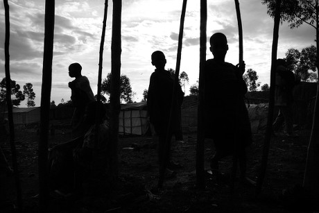 YOUNG REFUGEES WALK THROUGH MUGUNGA 1 Editorial Stock Photo - Stock ...