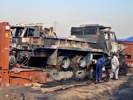 Private Security Guards Examine Burnt Trucks Editorial Stock Photo ...