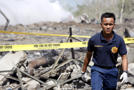 Filipino Policeman Walks Past Charred Male Editorial Stock Photo ...