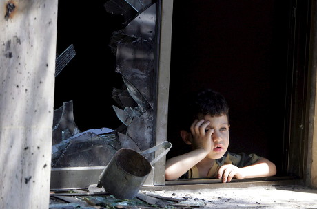 Lebanese Child Looks Out Damaged Wondow Editorial Stock Photo - Stock ...