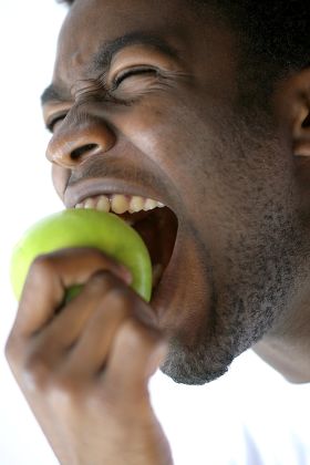 Model Released Black Man Eating Apple Editorial Stock Photo - Stock ...