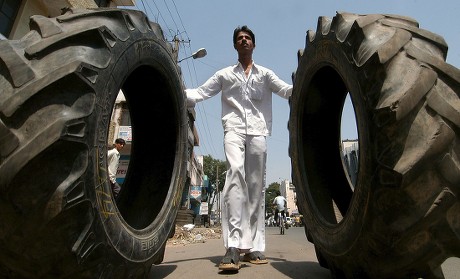 Worker Tyre Retreading Shop Pushes Huge Editorial Stock Photo - Stock ...