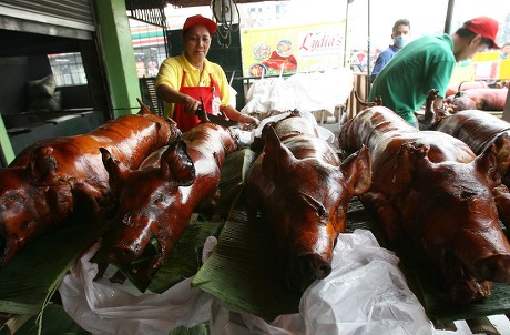 Filipino Worker Tends Roasted Pigs Locally Editorial Stock Photo ...