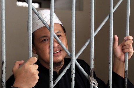 Indonesian Militant Abdullah Sunata Stands Behind Editorial Stock Photo ...