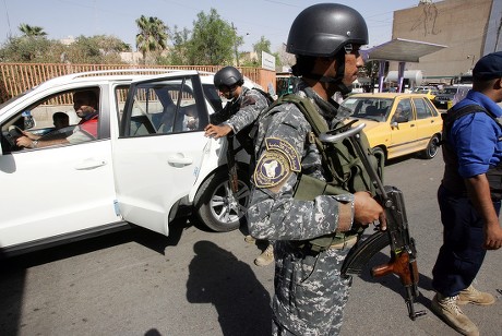 Iraqi Policemen Check Vehicle Checkpoint Central Editorial Stock Photo ...