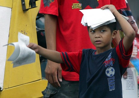 Young Filipino Boy Hands Out Sample Editorial Stock Photo - Stock Image ...