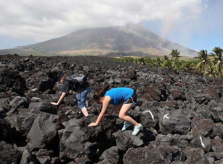 Tourists Traverse Through Lava Rocks Inside Editorial Stock Photo ...