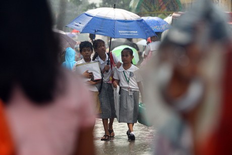Filipino Elementary Students Share Umbrella While Editorial Stock Photo ...