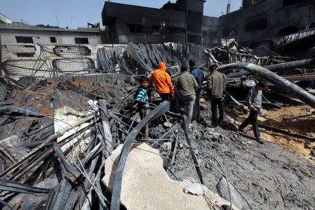 Palestinian Inspect Destroyed Factory After Israeli Editorial Stock ...