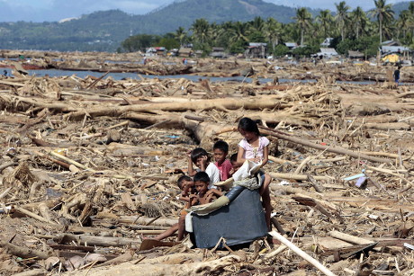 Filipino Children Play On Top Logs Editorial Stock Photo - Stock Image ...