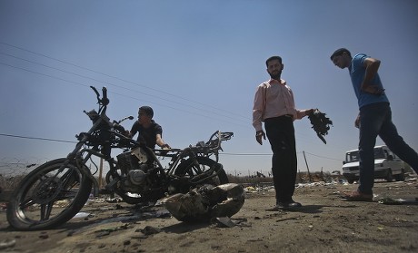 Palestinians Inspect Destroyed Motorcycle After Israeli Editorial Stock ...