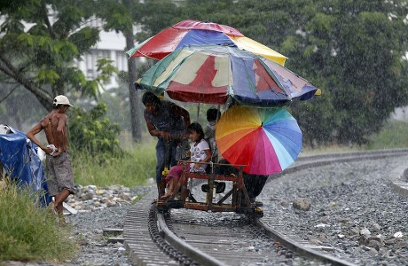 Filipinos Travel On Makeshift Trolley Rail Editorial Stock Photo ...