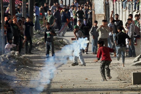 Kashmiri Muslim Protester Runs Tear Smoke Editorial Stock Photo - Stock ...