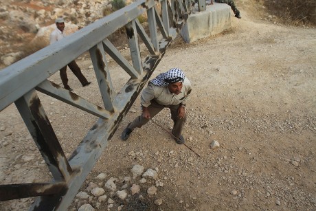 Palestinian Man Passes Under Gate On Editorial Stock Photo - Stock ...