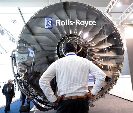 Man Looks Over Rolls Royce Aircraft Editorial Stock Photo - Stock Image ...