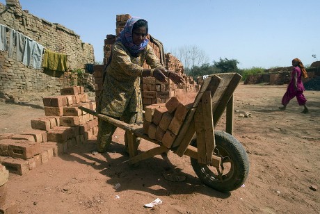 Indian Woman Labourer Loads Bricks On Editorial Stock Photo - Stock ...