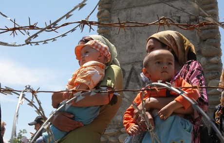 Ethic Uzbek Refugees Walk Behind Barbed Editorial Stock Photo - Stock ...