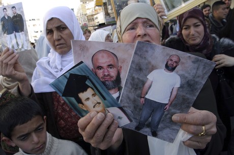 Palestinian Woman Holds Pictures Her Imprisoned Editorial Stock Photo ...