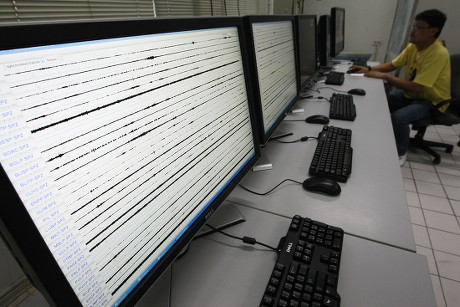 Earthquake Activity Graph Projected On Computer Editorial Stock Photo ...