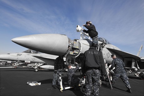 Us Navy Crewmen Work On Fa18ef Editorial Stock Photo - Stock Image ...