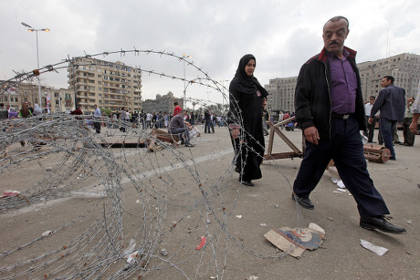 Egyptian Walks Past Barbed Wire Installed Editorial Stock Photo - Stock ...