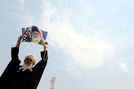 Iranian Clergy Man Holds Poster Irans Editorial Stock Photo - Stock ...