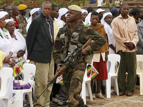 Zimbabwe Soldier Walks Past Guests Honouring Editorial Stock Photo ...