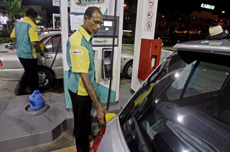 Two Gas Station Workers Fill Cars Editorial Stock Photo - Stock Image ...
