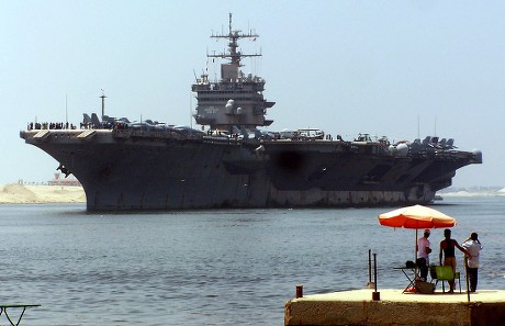 Egyptians Watch Us Nuclearpowered Aircraft Carrier Editorial Stock ...