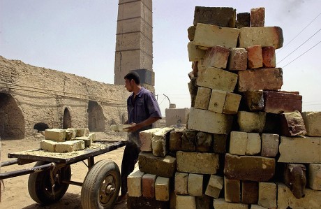 Iraqi Man Loads Bricks On Donkey Editorial Stock Photo - Stock Image ...