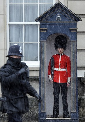 British Police Officer Walks Past Soldier Editorial Stock Photo - Stock ...
