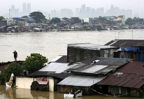 Filipino Resident Stands On Top Roof Editorial Stock Photo - Stock ...
