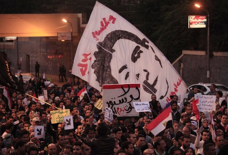 Egyptian Protesters Hold Giant Banner Depicting Editorial Stock Photo ...