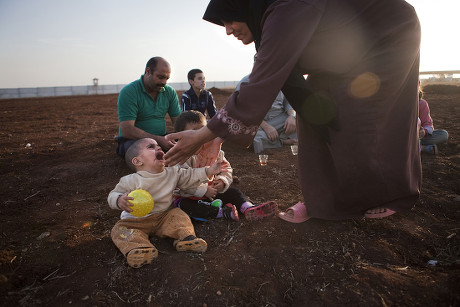 Syrian Refugee Woman Tends Her Crying Editorial Stock Photo - Stock ...