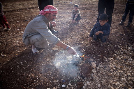 Syrian Refugee Prepares Tea Over Small Editorial Stock Photo - Stock ...