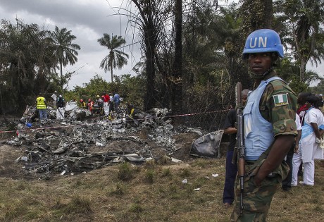 Nigeria Un Peacekeeper Stands Near Wrekage Editorial Stock Photo ...