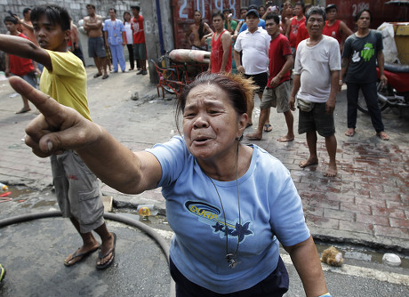 Filipino Reacts While Watching Her House Editorial Stock Photo - Stock ...