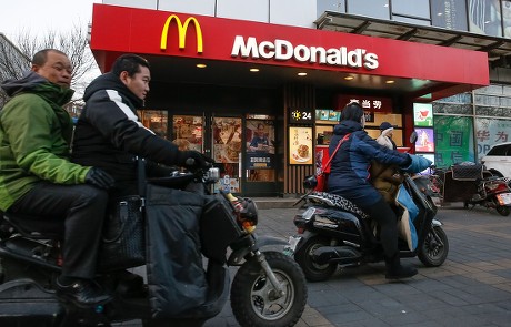 People Ride On Scooters Next Mcdonalds Editorial Stock Photo - Stock ...