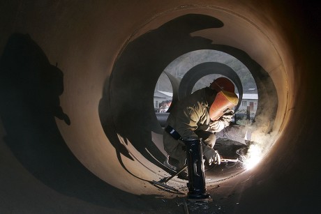 Worker Welds Inside Large Steel Pipe Editorial Stock Photo - Stock ...