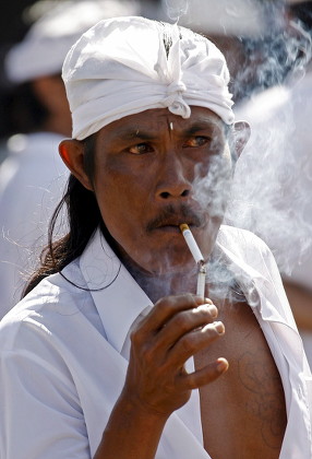 Balinese Smoker Lights Cigarette Denpasar Bali Editorial Stock Photo ...